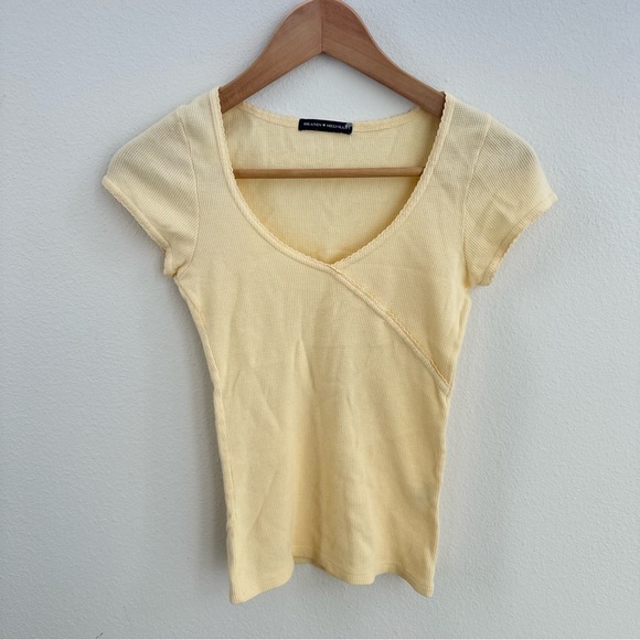 Brandy Melville | Tops | Yellow Brandy Melville Tee With A Cute ...